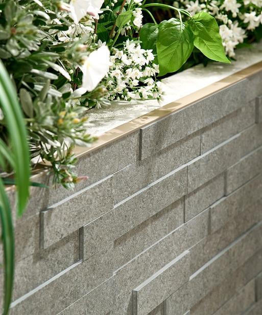 Everscape™ Interlock Earthstone Beige Tile (60cm x 15cm) | Topps Tiles